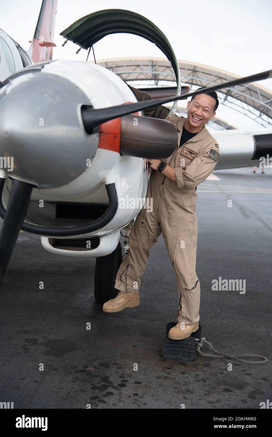Pilot, conducts a pre flight inspection hi-res stock photography and ...