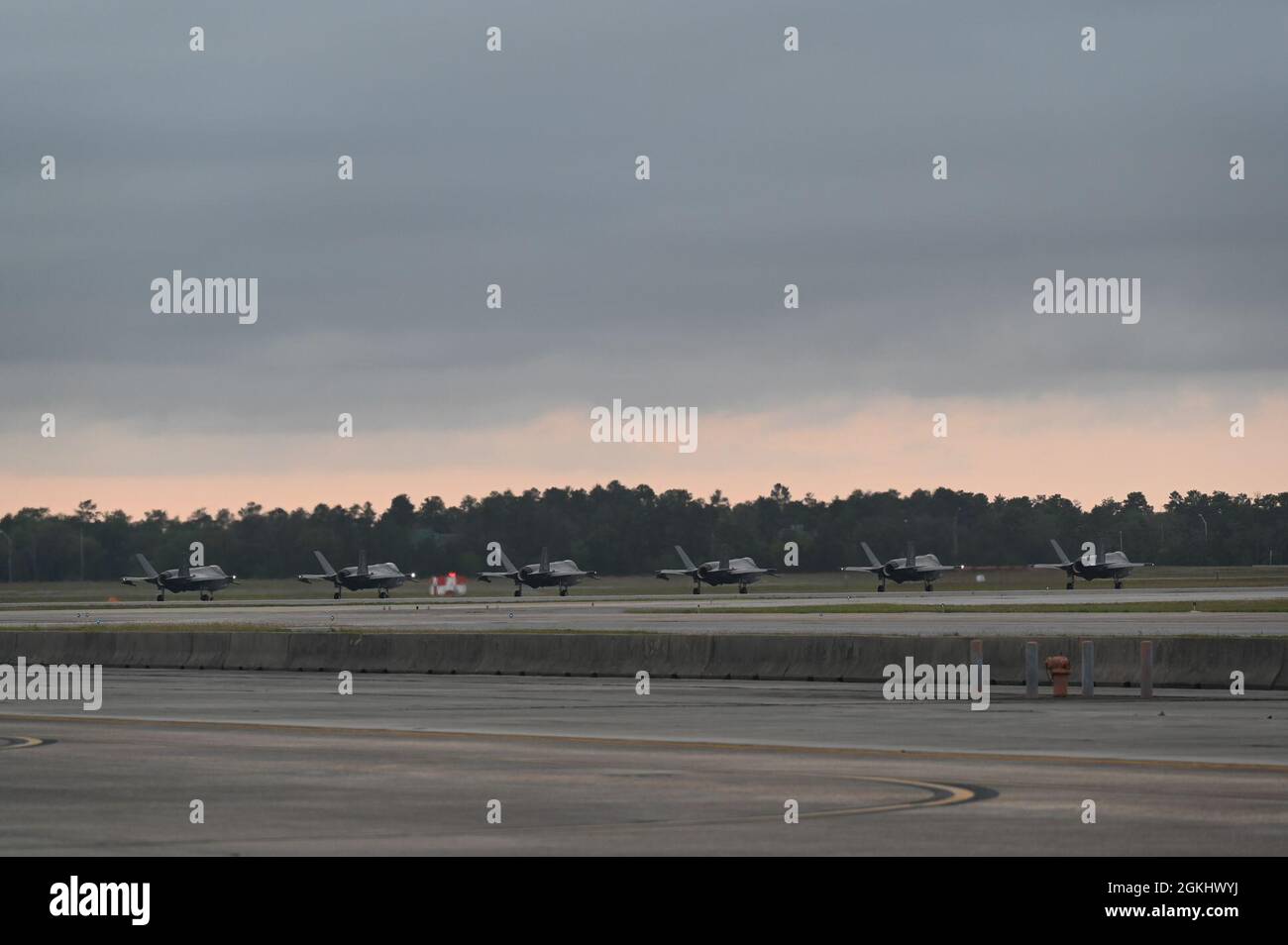 Six F-35A Lightning II jets, assigned to the 33rd Fighter Wing, prepare ...