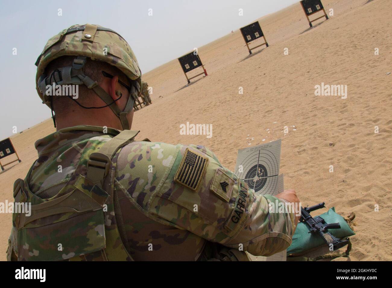 Sgt. Jonathan Garrant, Task Force Avalanche, contemplates his paper ...