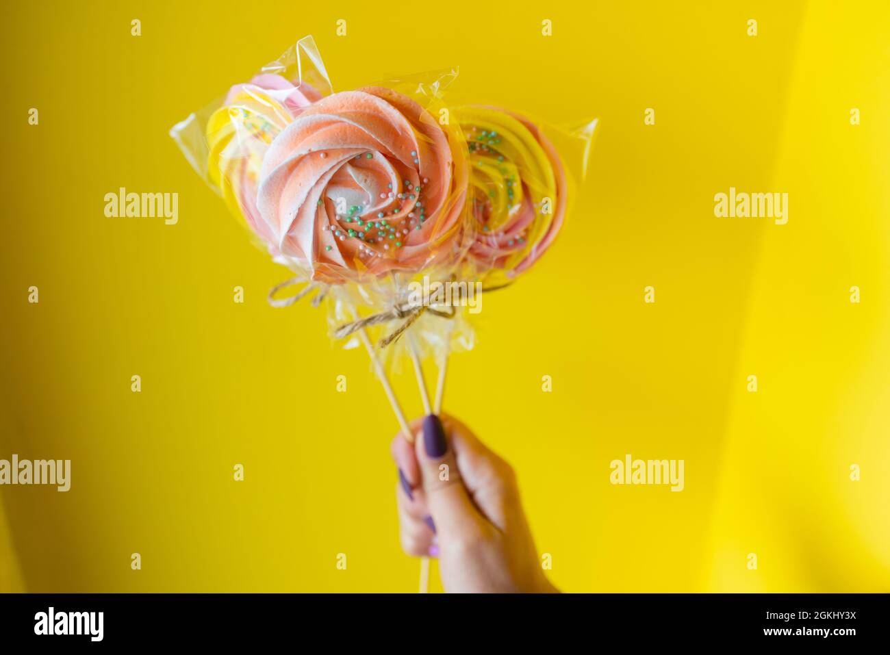 Candy In Hand High Resolution Stock Photography and Images - Alamy
