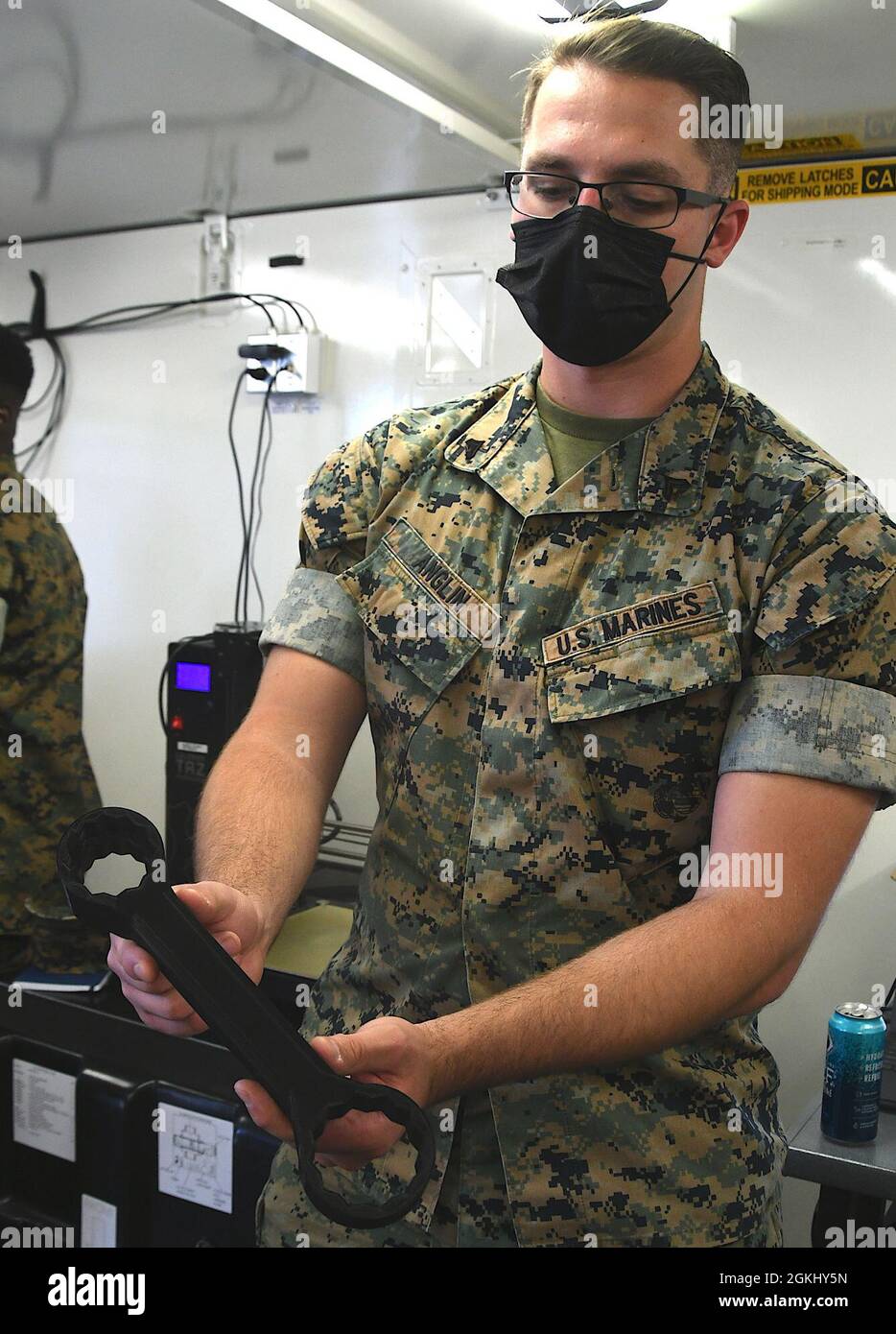 U.S. Marine Cpl. Tyler Anglin, 1st Maintenance Battalion, holds a 3D ...