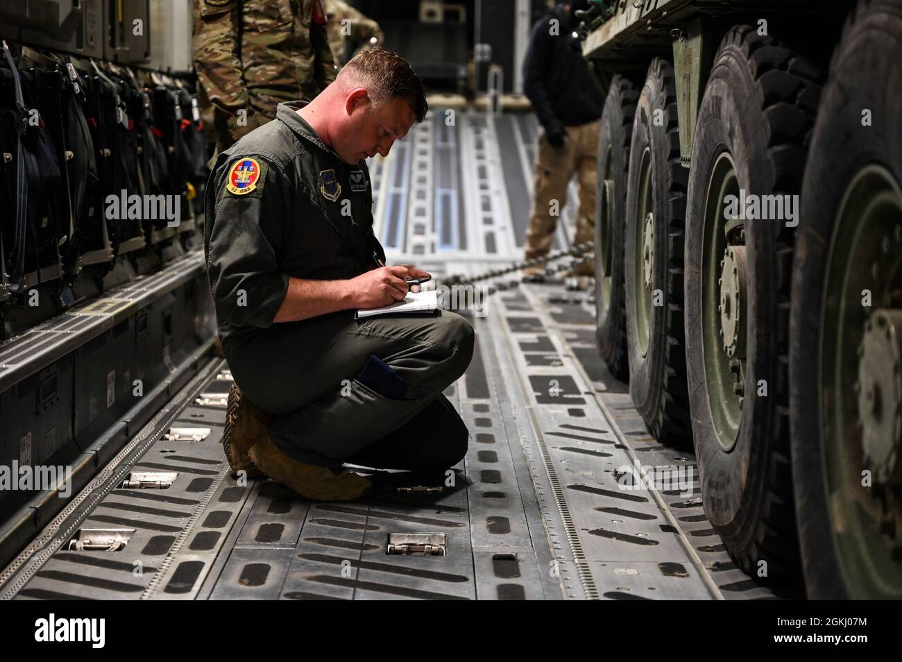 U.S. Air Force Staff Sgt. Flint Yerian, 8th Airlift Squadron loadmaster ...