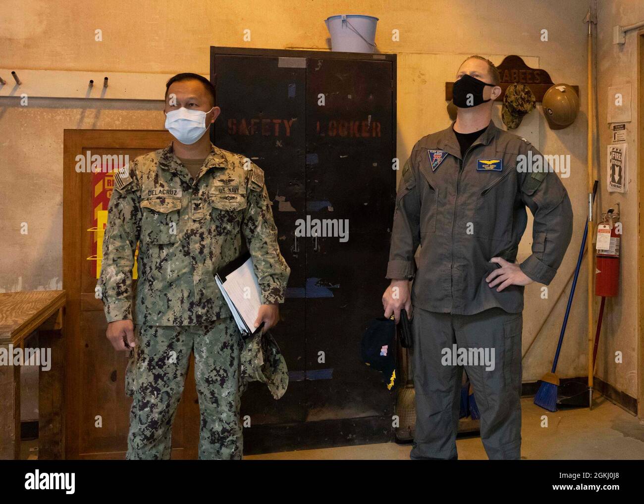 CAMP SHIELDS, Japan (Apr. 28, 2021) Capt. Scott Hardy, right, Commander ...