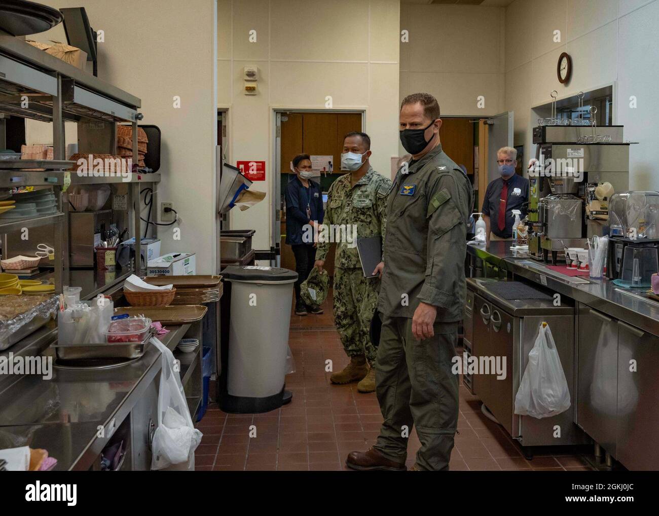 CAMP SHIELDS, Japan (Apr. 28, 2021) Capt. Scott Hardy, right, Commander ...
