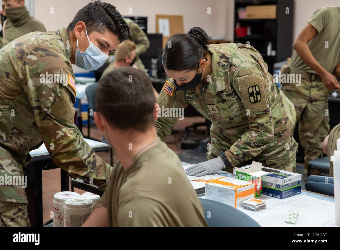 U.S. Army Combat Medics assigned to 433rd Medical Detachment, 32nd ...