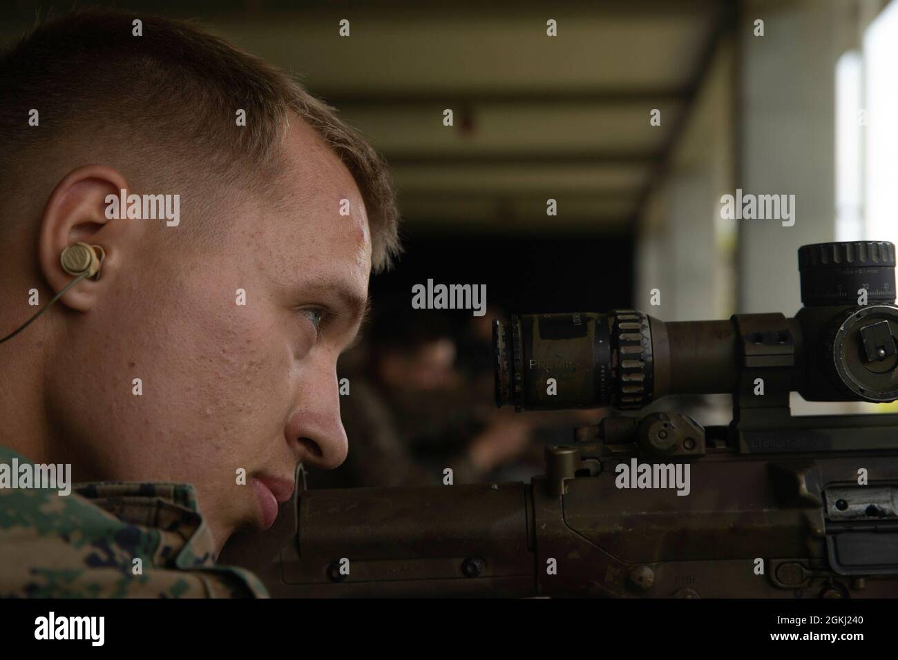 U.S. Marine Corps Pfc. Hunter Anderson, a scout sniper with 2nd ...