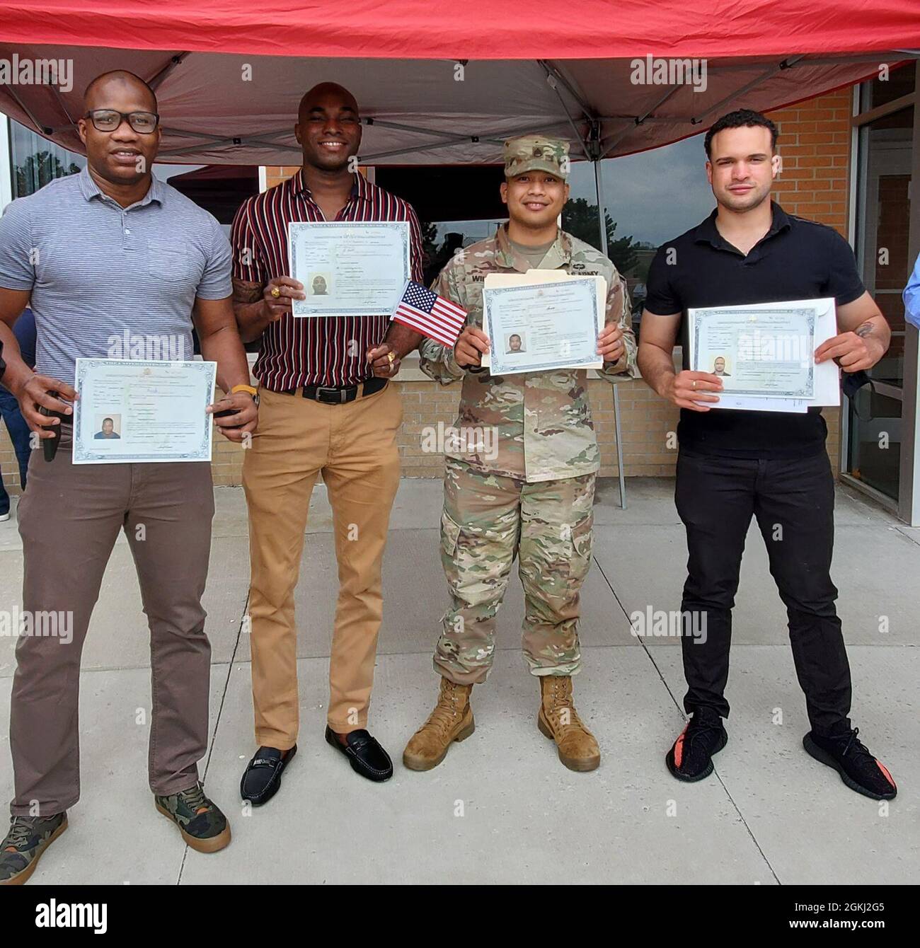 Left to right, originally from Mali, Spc. Aruna Sangari from 1st ...