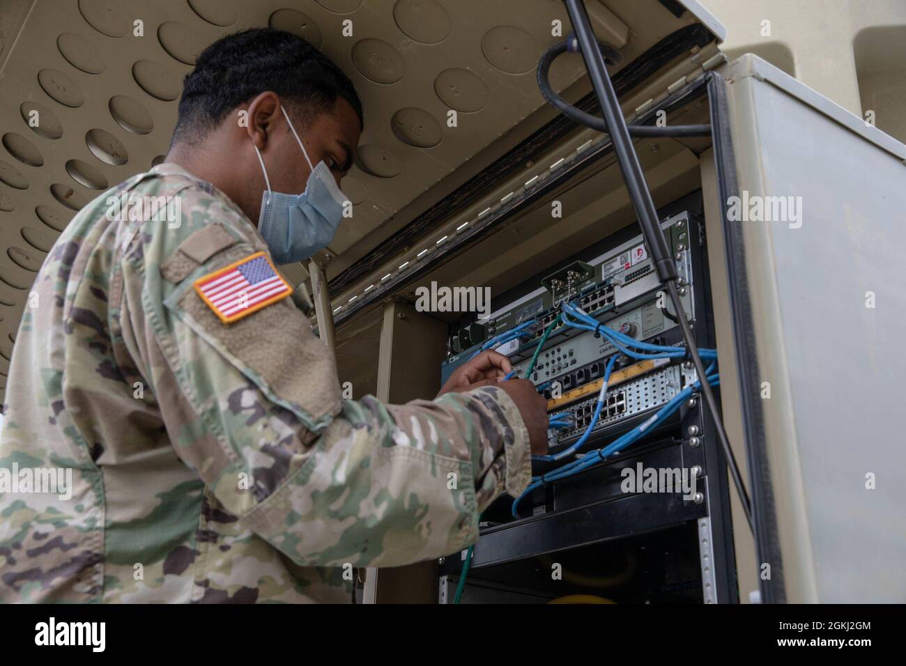 U.S. Army Spc. Jason Farrison, a multichannel transmission systems ...
