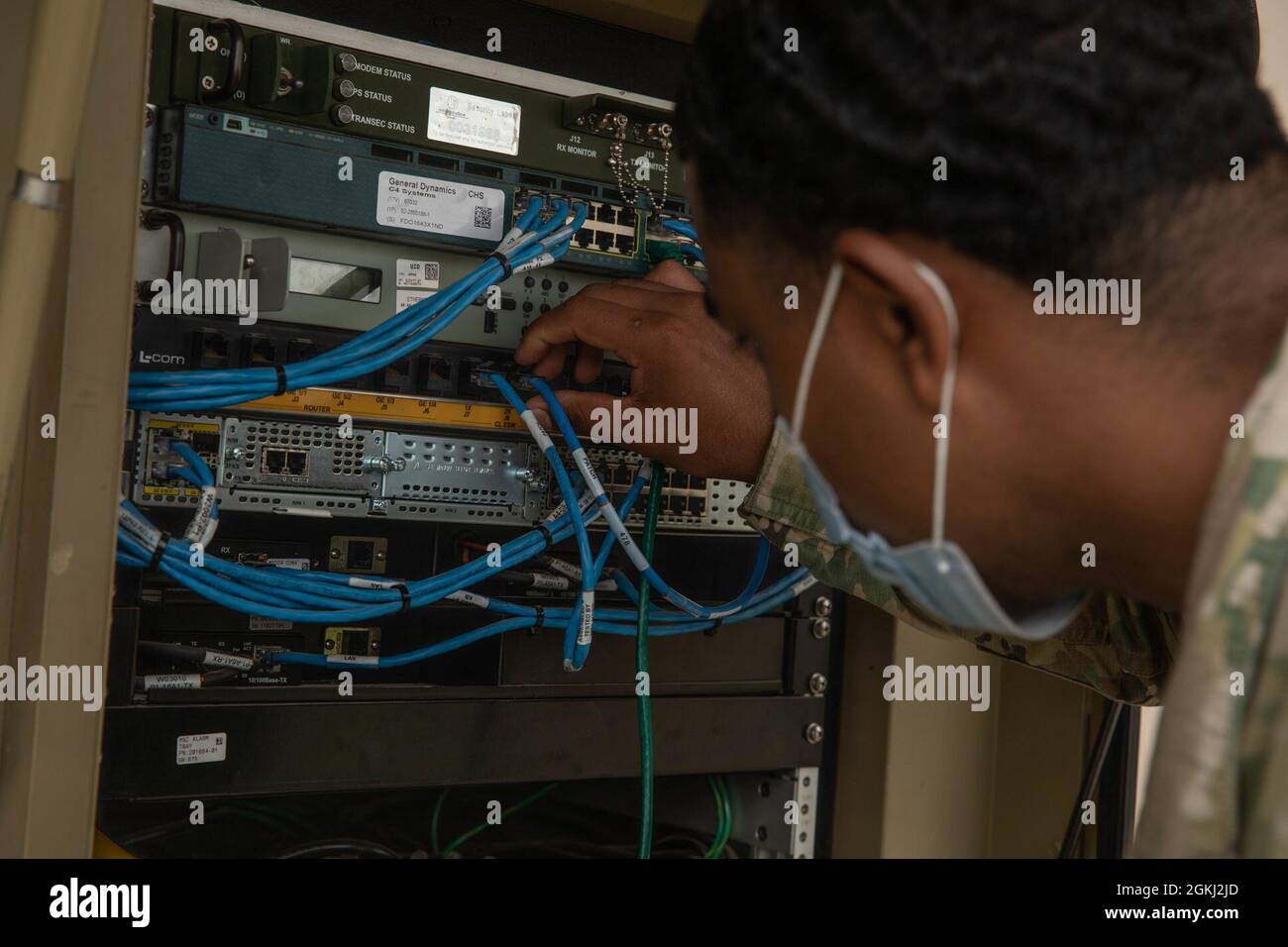 U.S. Army Spc. Jason Farrison, a multichannel transmission systems ...