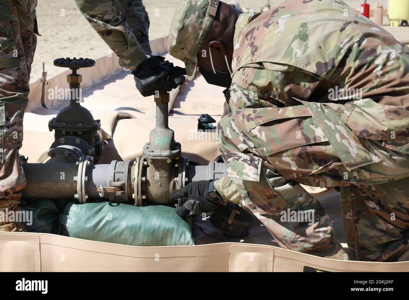 U.S. Army Sgt. Makeem Perinon, a petroleum supply specialist assigned ...