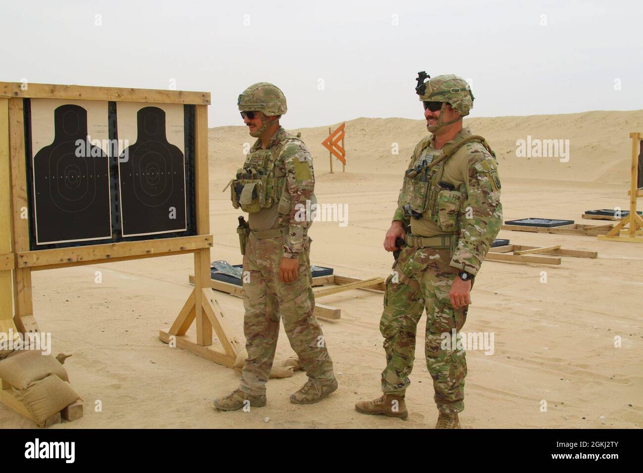 Task Force Spartan Soldiers share a moment of comradery during a break ...