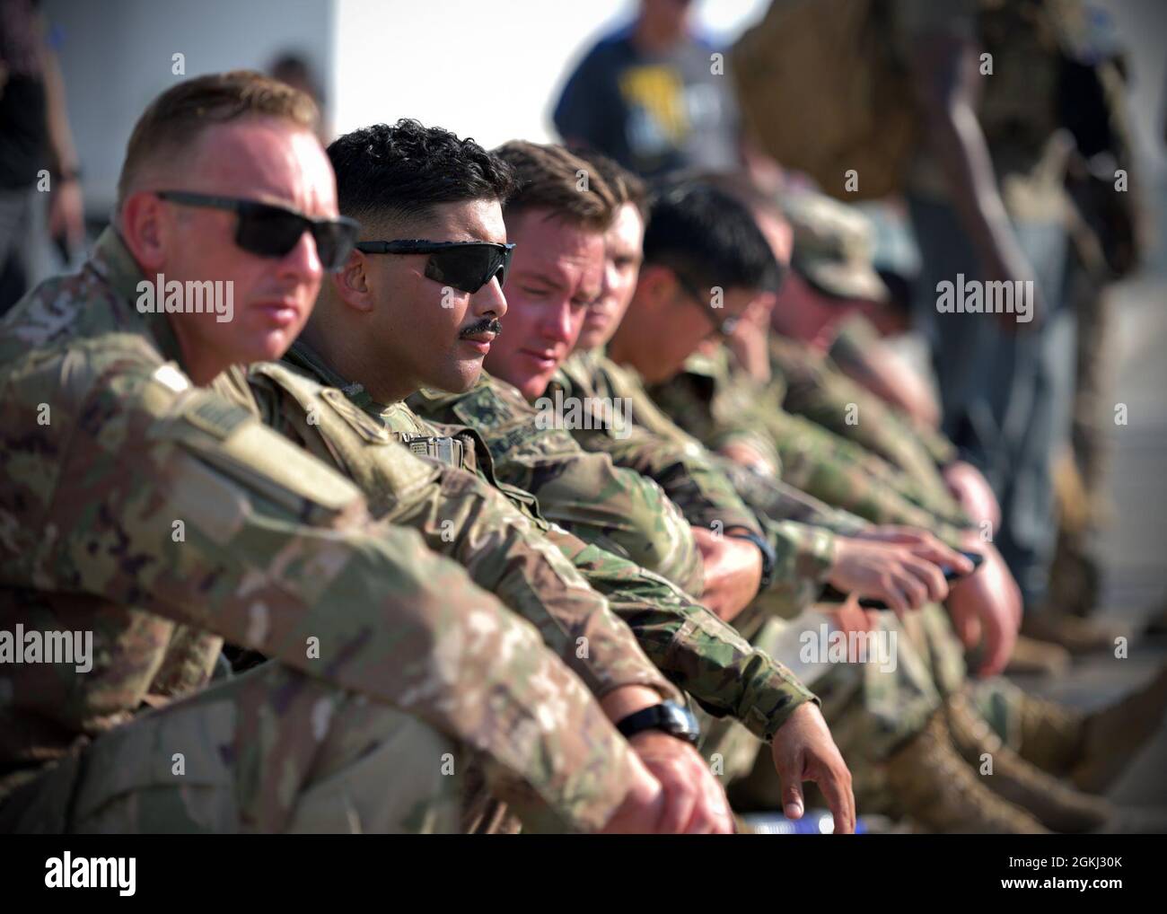 U.S. military troops participate in a ruck march for National Police ...