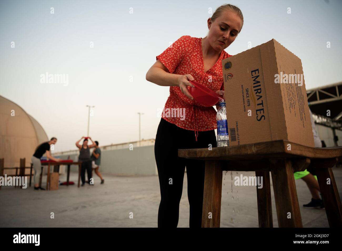 U.S. Air Force Capt. Emma Wahlig participates in a team building game ...