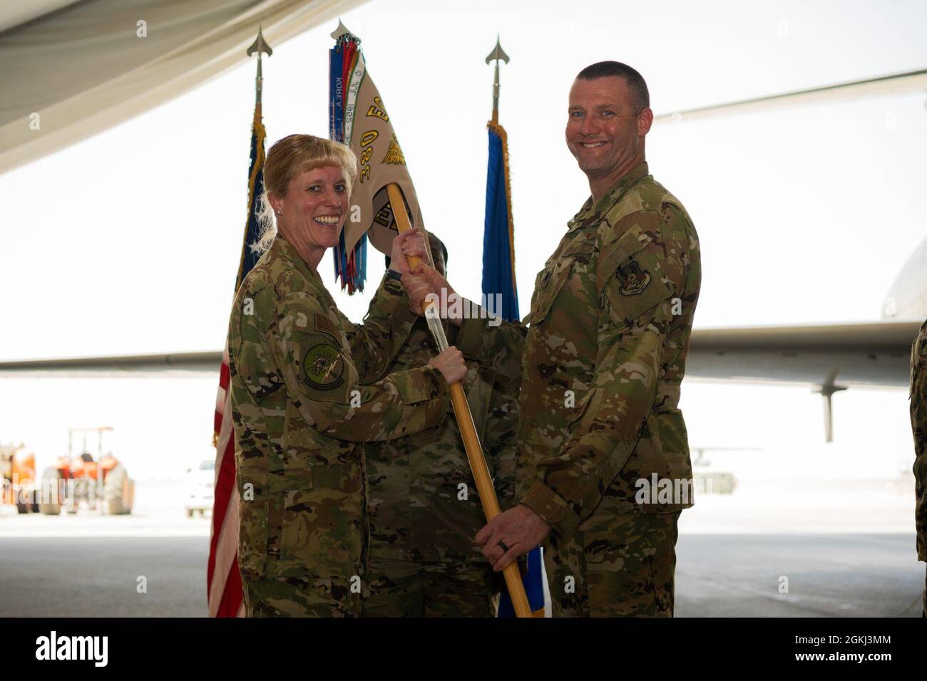 U.S. Air Force Lt. Col. Gregory Steenberge, right, outgoing 430th ...