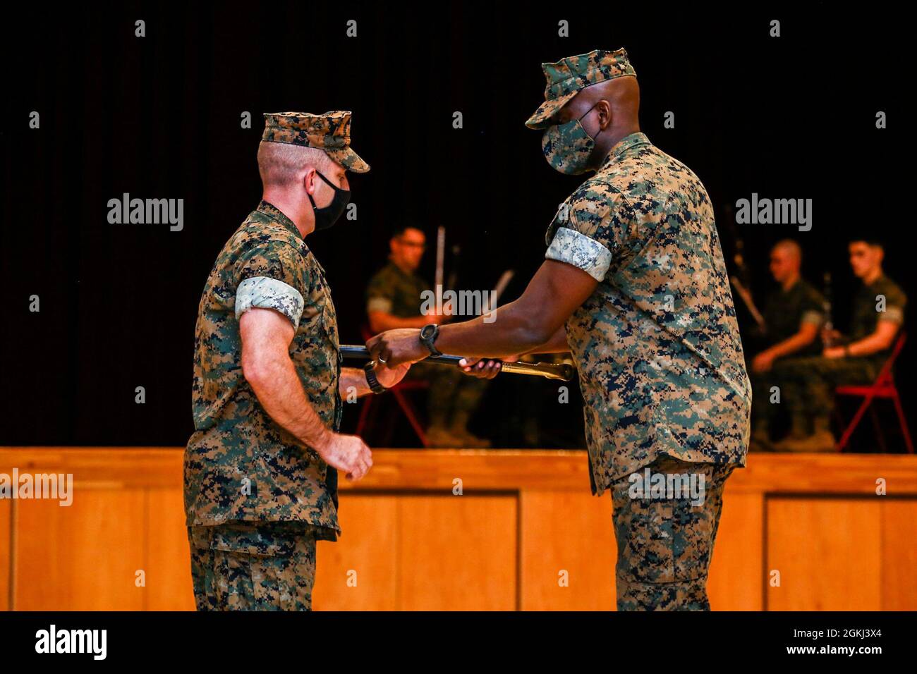 U.S. Marine Corps Lt. Col. Jarrad S. Caola, left, commander of 3d ...