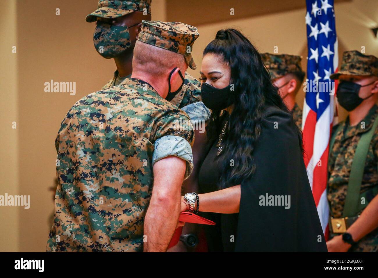 Mrs. Jaymie Summer Jennings, right, receives a certificate of ...