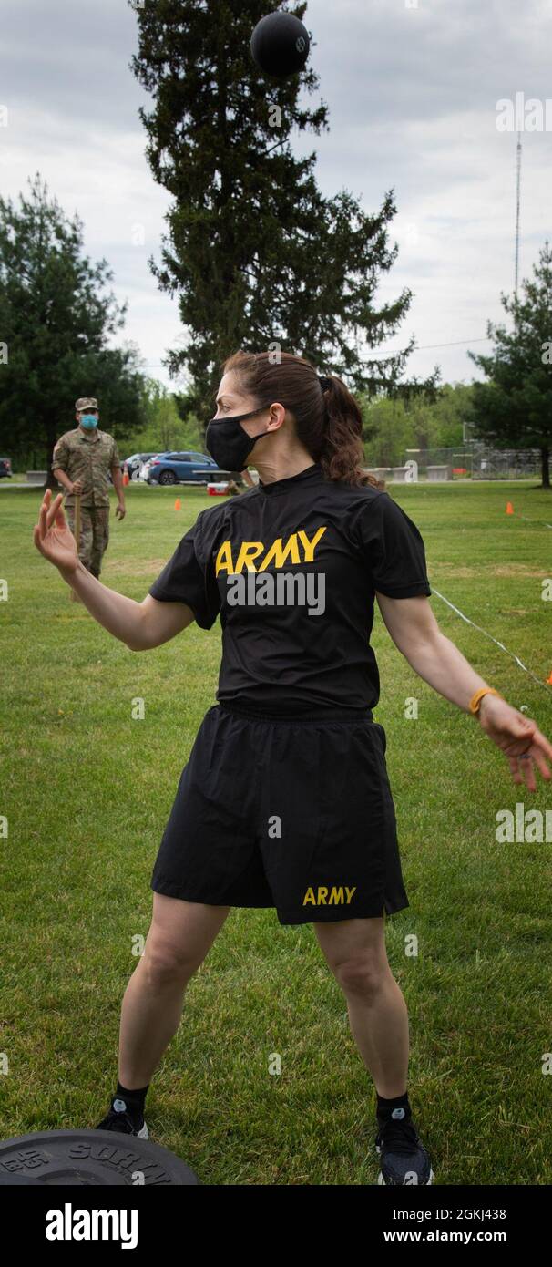 Maj. Laura Anderson performs the standing power throw as part of the ...
