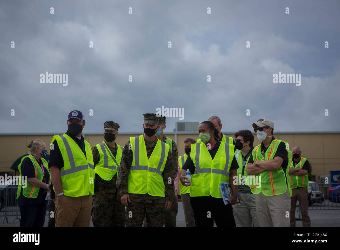 U.S. Marine Major Michael Griner, center left, and FEMA Director of ...
