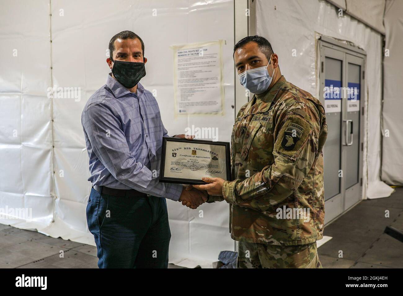 U.S. Army Lt. Col. Derek Di Bello, right, the Commander of 426th ...