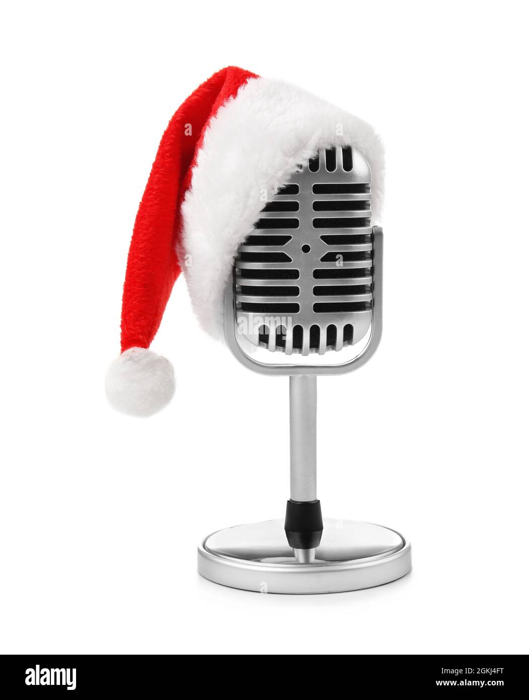 Microphone in Santa hat on white background. Christmas music concept ...