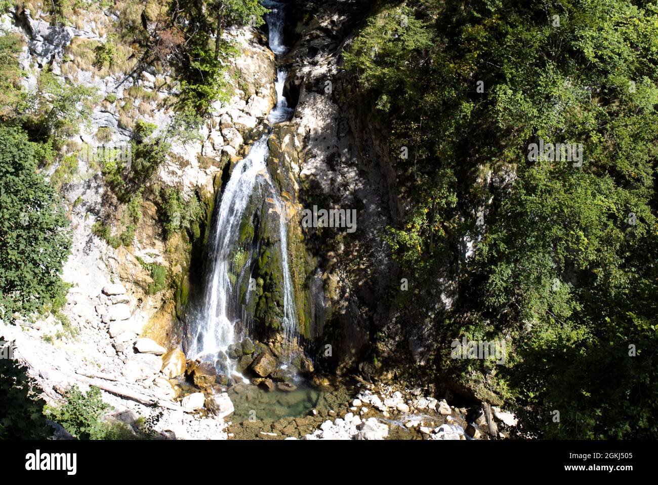 Beautiful aerial view of an exotic waterfall running down a cliff ...