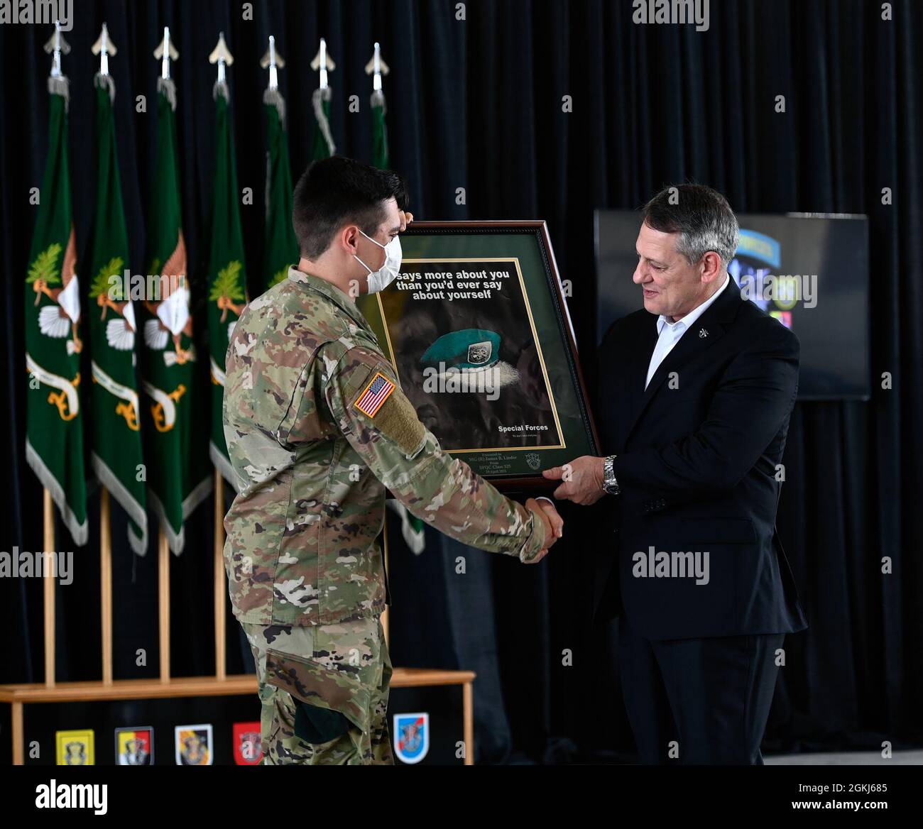 Major General James B. Linder, U.S. Army retired, receives a framed ...