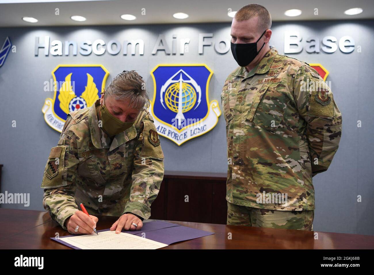 Col. Katrina Stephens, installation commander, signs a proclamation in ...