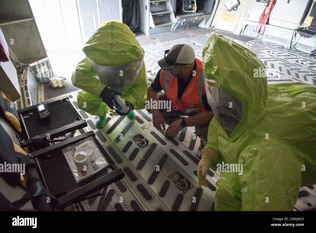 Chris Keesee, center, CBRN training project manager for Federal ...