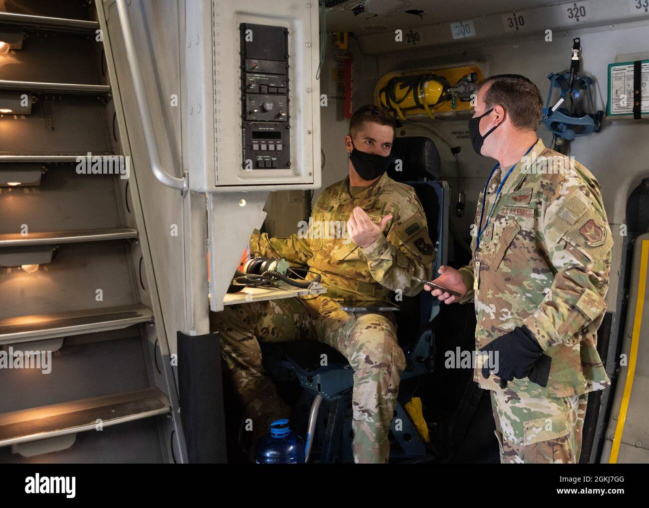 U.S. Air Force Staff Sgt. Ryan Myers, left, and Master Sgt. Shane ...