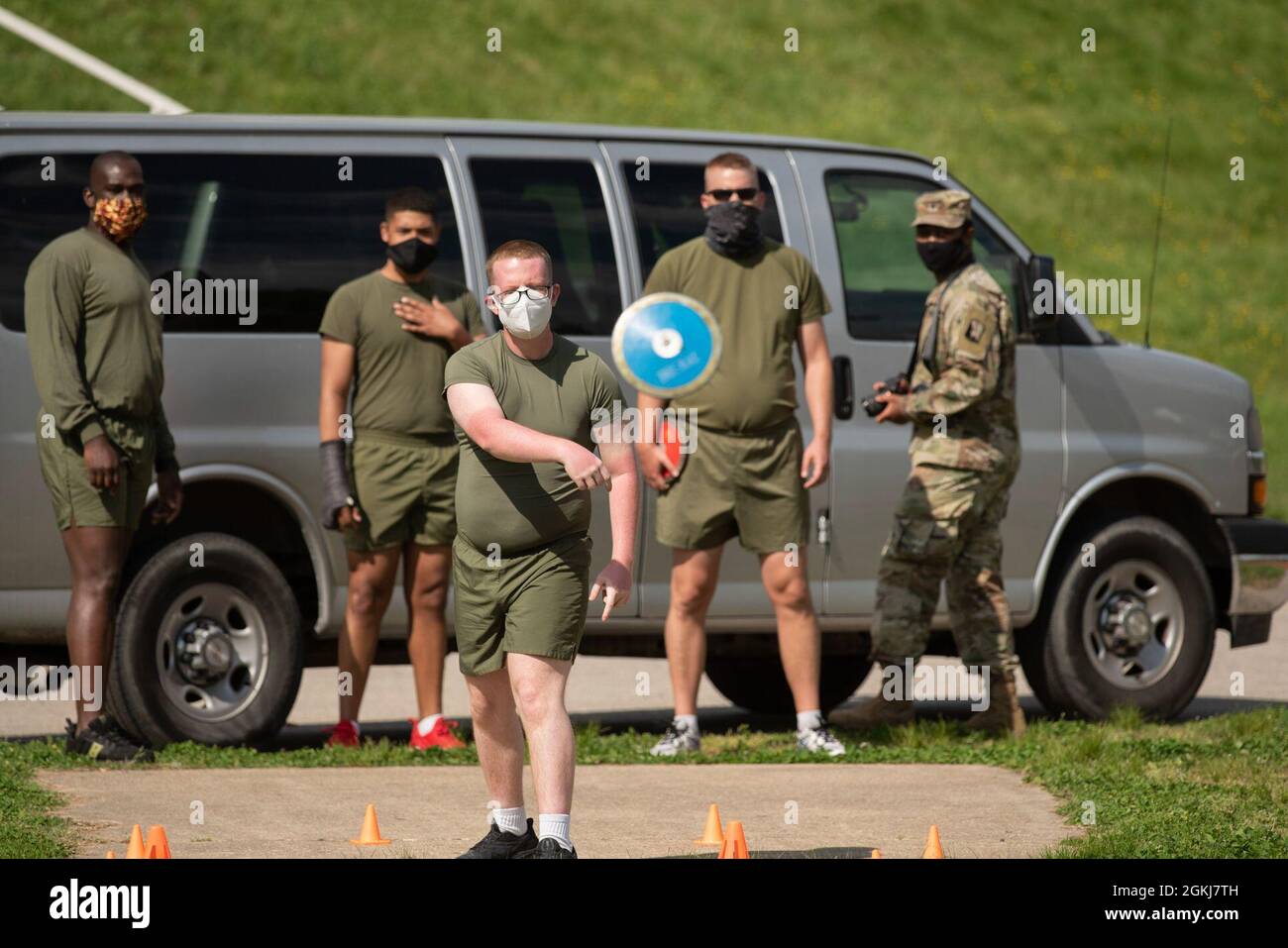 U.S. Marine Corps Cpl. Nathan Cole competes in discus at the Track and ...