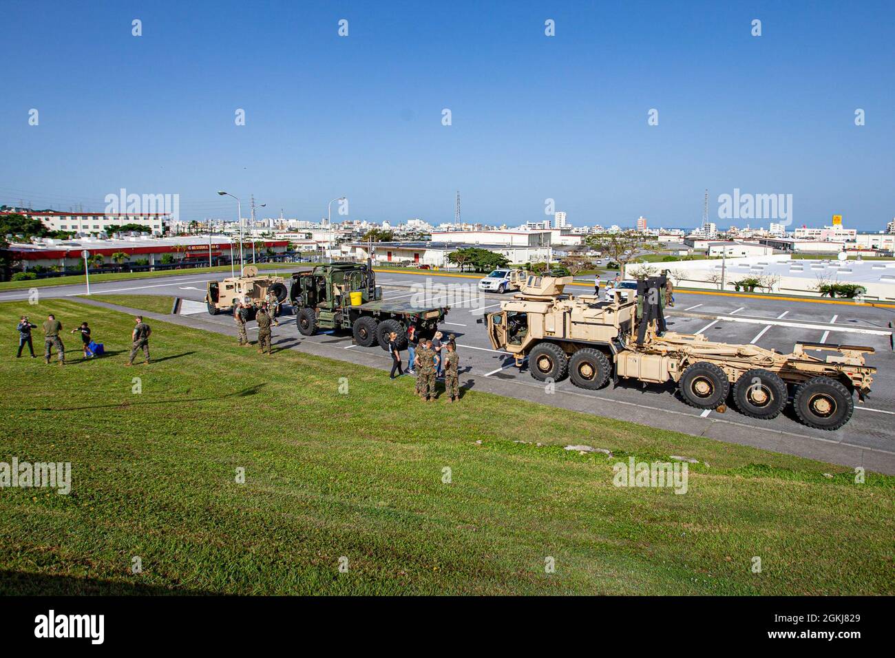 U.S. Marines, sailors and their children gather around Headquarters and ...