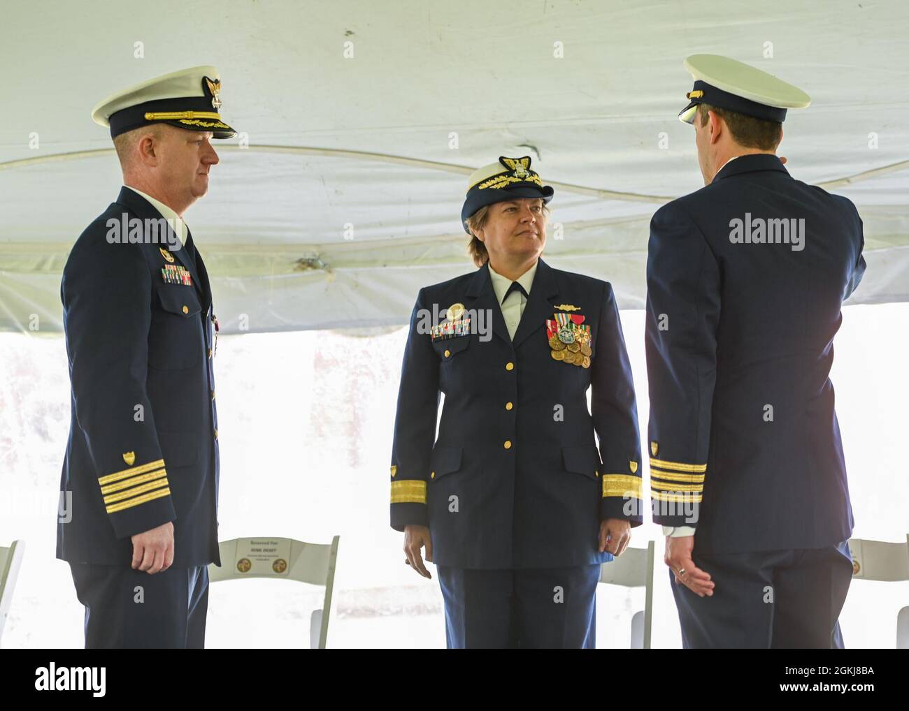 Capt. David O’Connell salutes Rear Adm. Laura Dickey, commander of the ...
