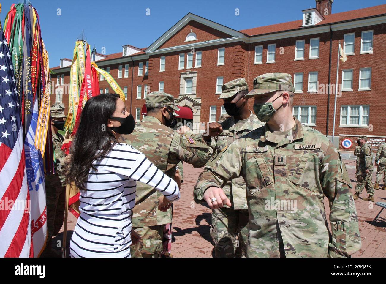 1st TSC Soldiers line up to congratulate Lt. Col. Benjamin Rosario ...