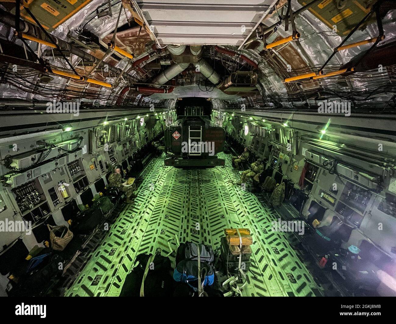 U.S. Air Force 62nd Airlift Wing (62nd AW) Airmen transport an R-11 ...