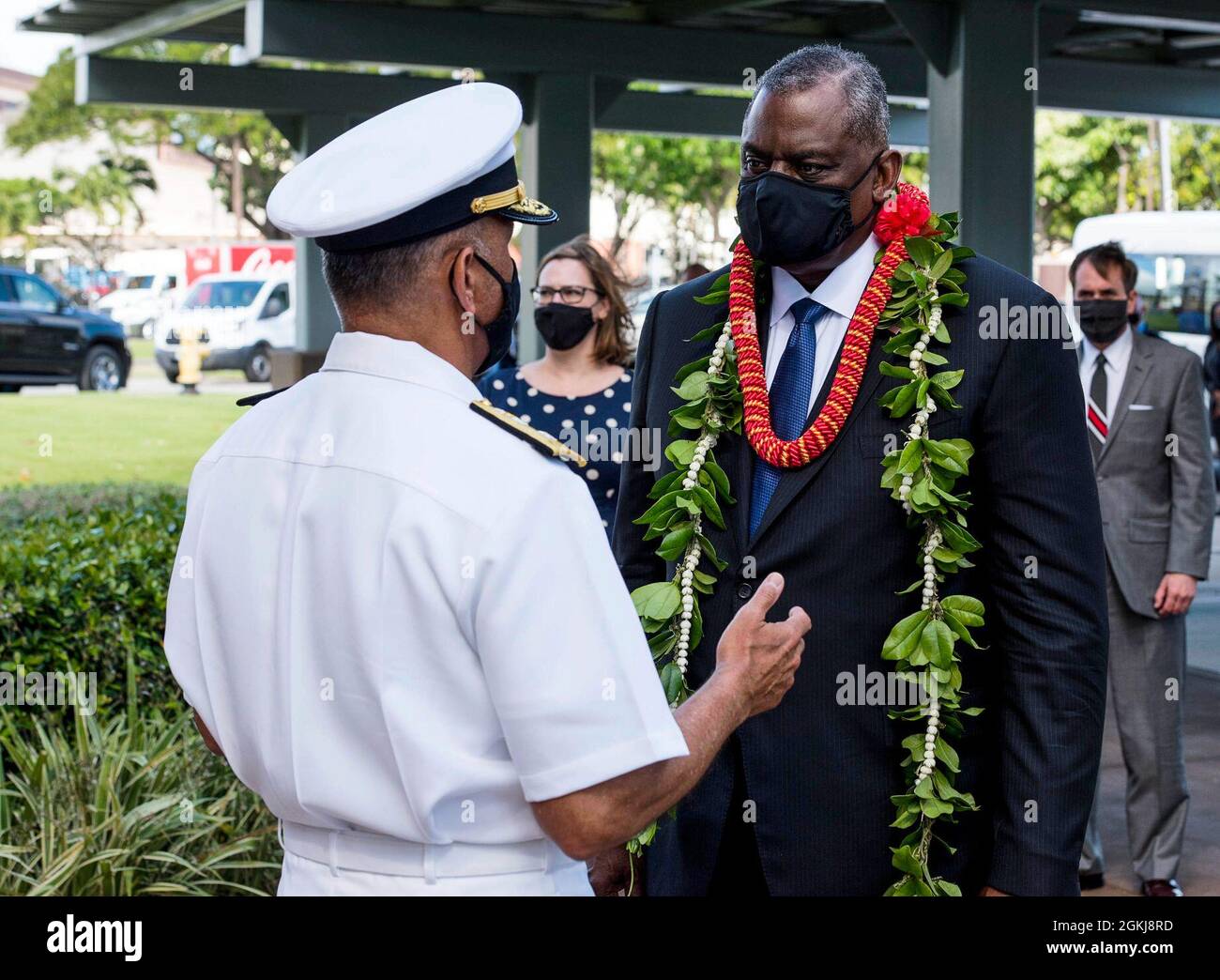 Secretary of Defense Lloyd J. Austin III speaks with U.S. Navy Rear Adm ...