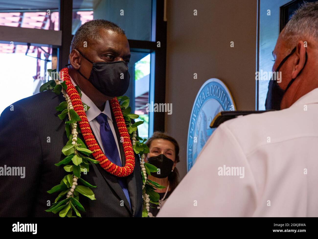 Secretary of Defense Lloyd J. Austin III speaks with U.S. Navy Rear Adm ...