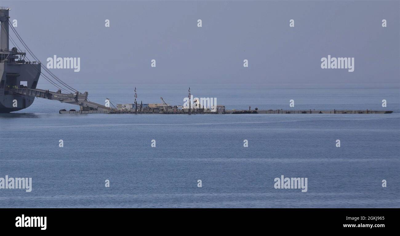 The United States Naval Ship Bob Hope has its loading platform extended ...