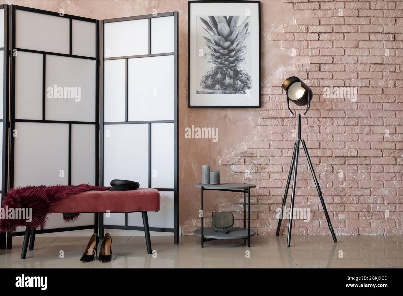 Interior of modern room with stylish folding screen Stock Photo - Alamy