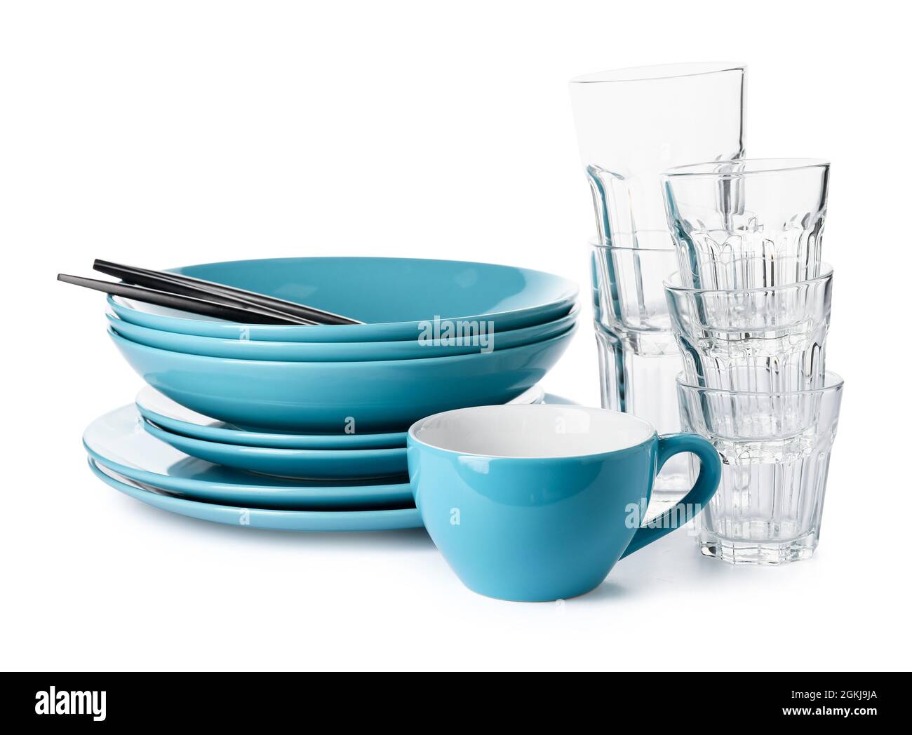 Set of blue clean dishes on white background Stock Photo - Alamy