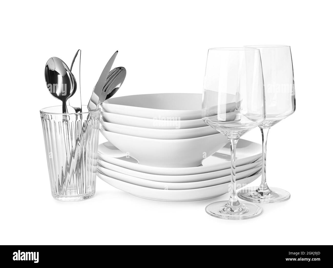 Different clean dishes on white background Stock Photo - Alamy