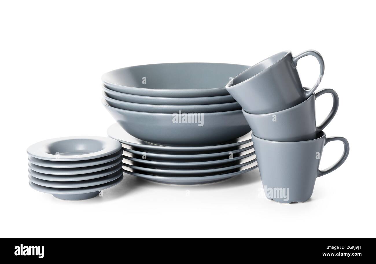 Set of grey clean dishes on white background Stock Photo - Alamy