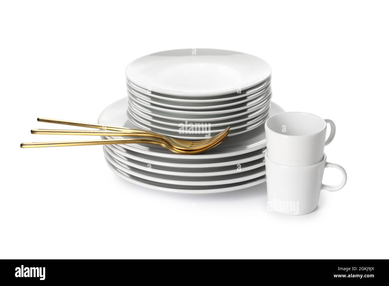 Different clean dishes on white background Stock Photo - Alamy