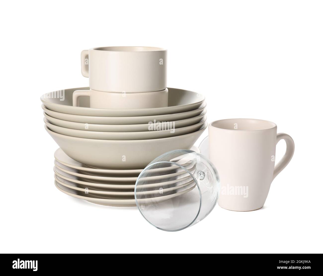 Set of light clean dishes on white background Stock Photo - Alamy