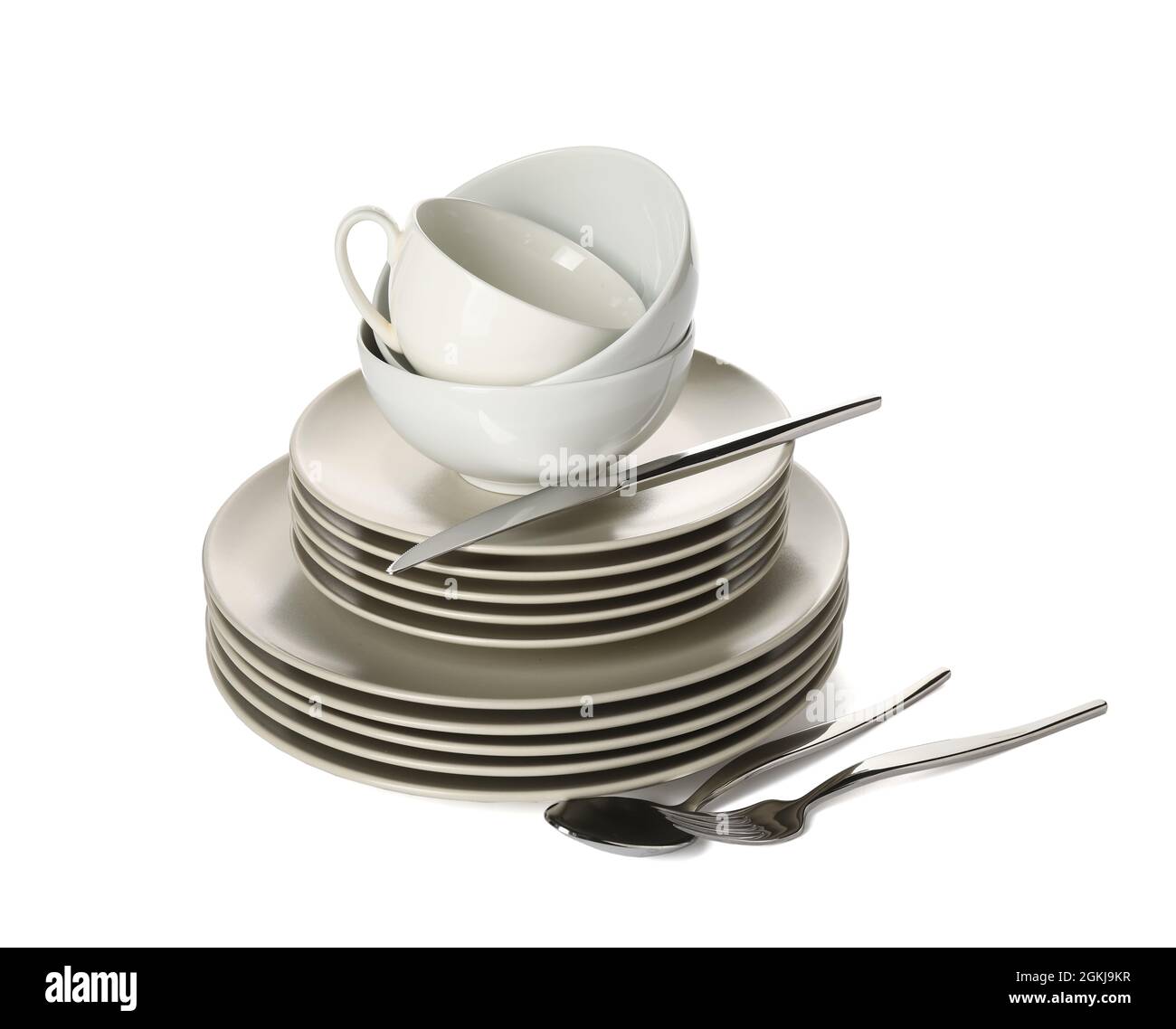 Set of light clean dishes on white background Stock Photo - Alamy