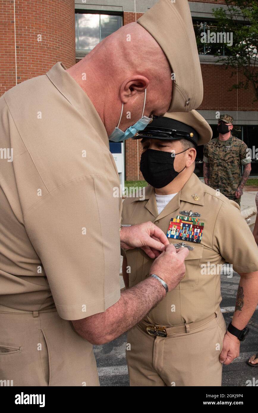 Navy Capt. Douglas Stephens, left, Commander of Naval Health Clinic ...