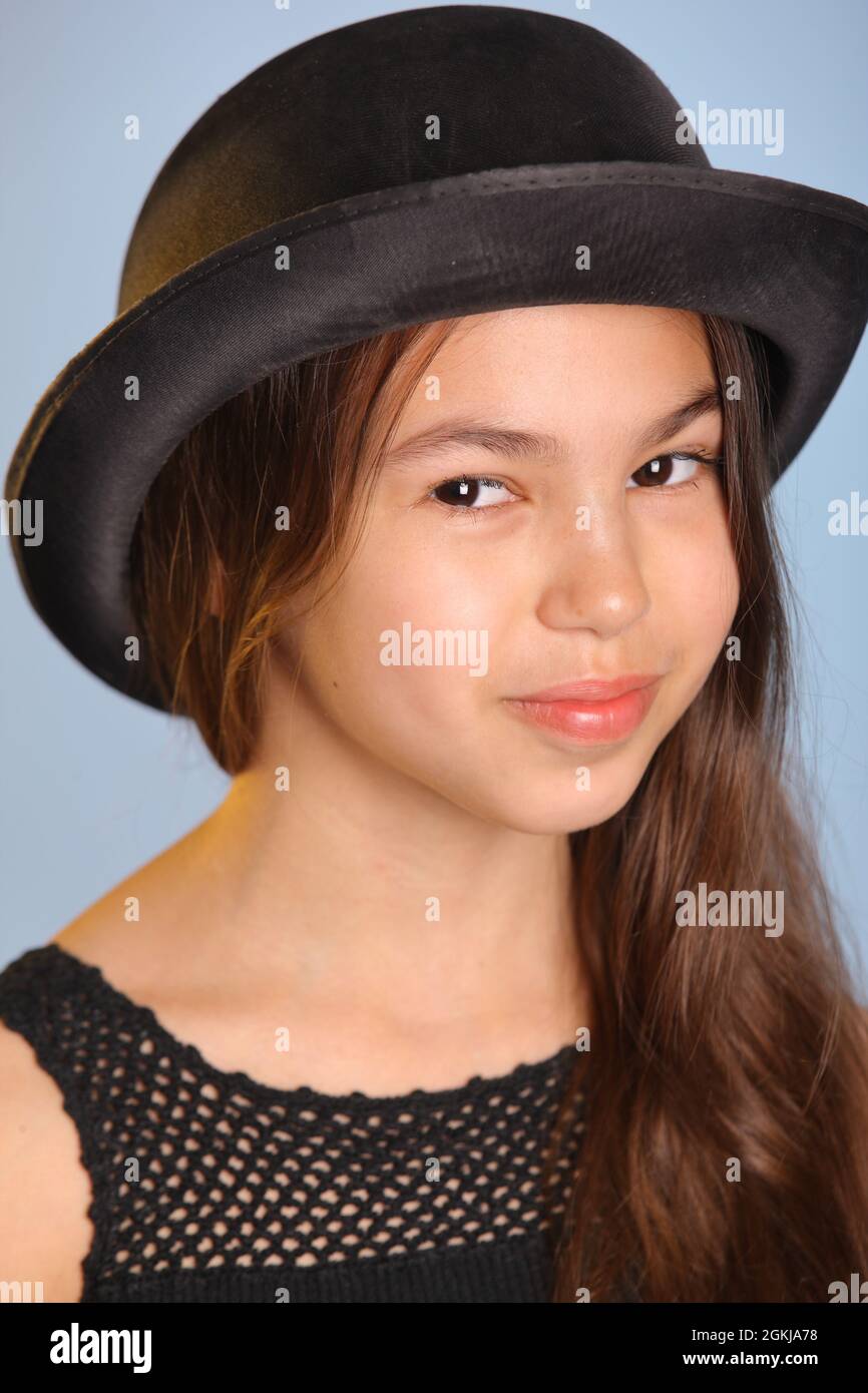 Close-up portrait of a bright cute dark-haired teenage girl 12 years ...