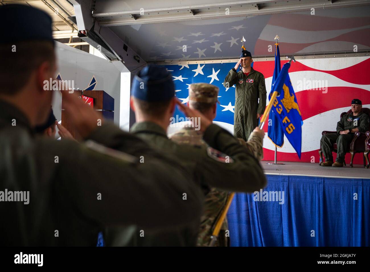 Lt. Col. Drew Bures, incoming 333rd Fighter Squadron commander, gives ...