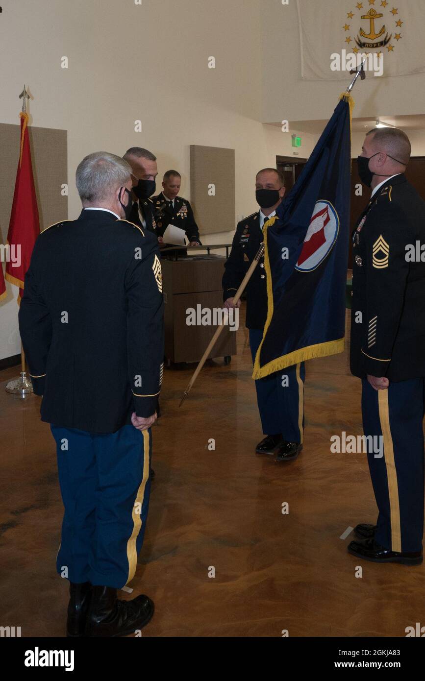 Command Sgt. Maj. Steven B. Wooldridge passes the organizational colors ...