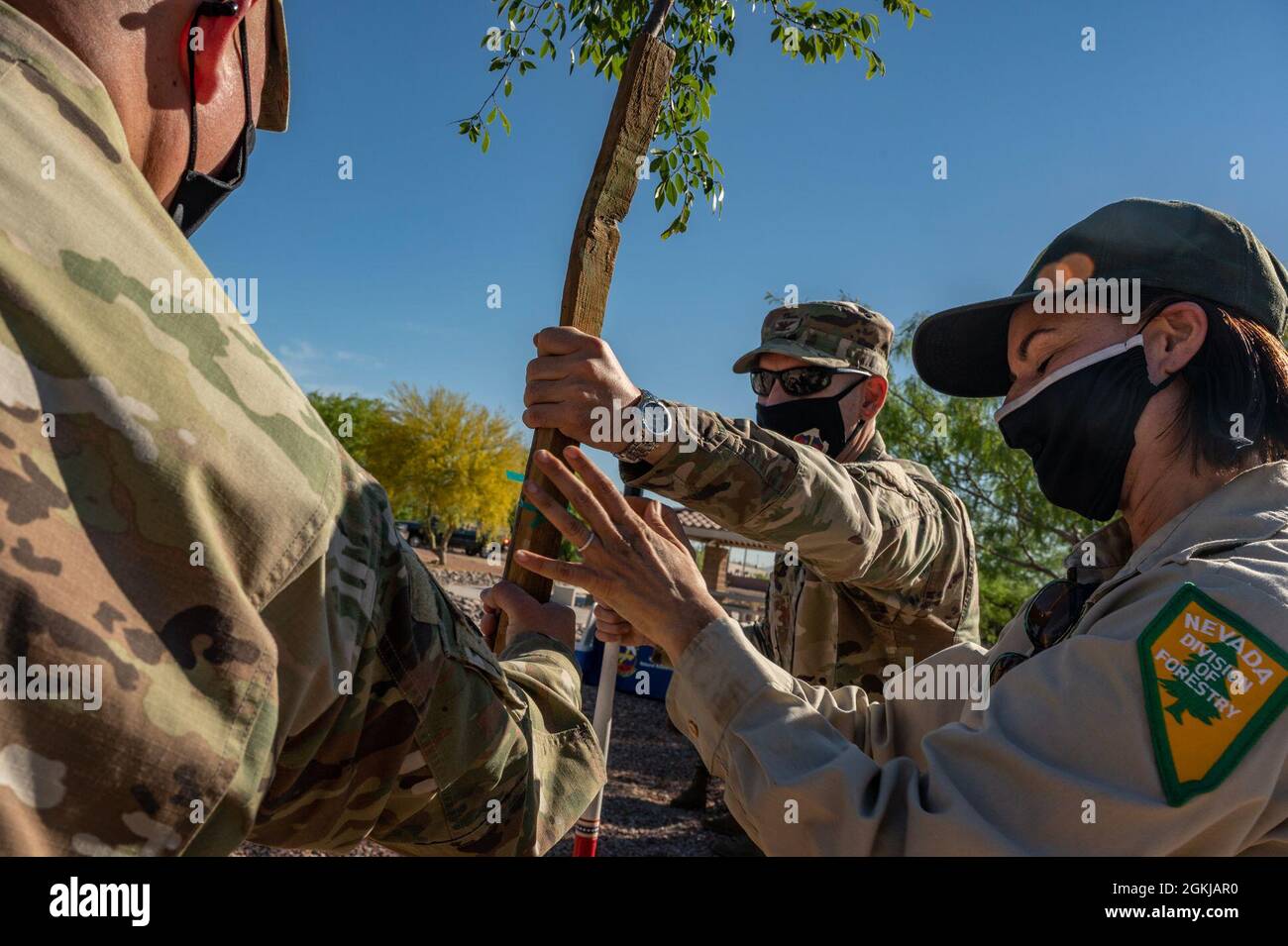Col. Anthony Figiera, 99th Mission Support Group commander, holds an ...