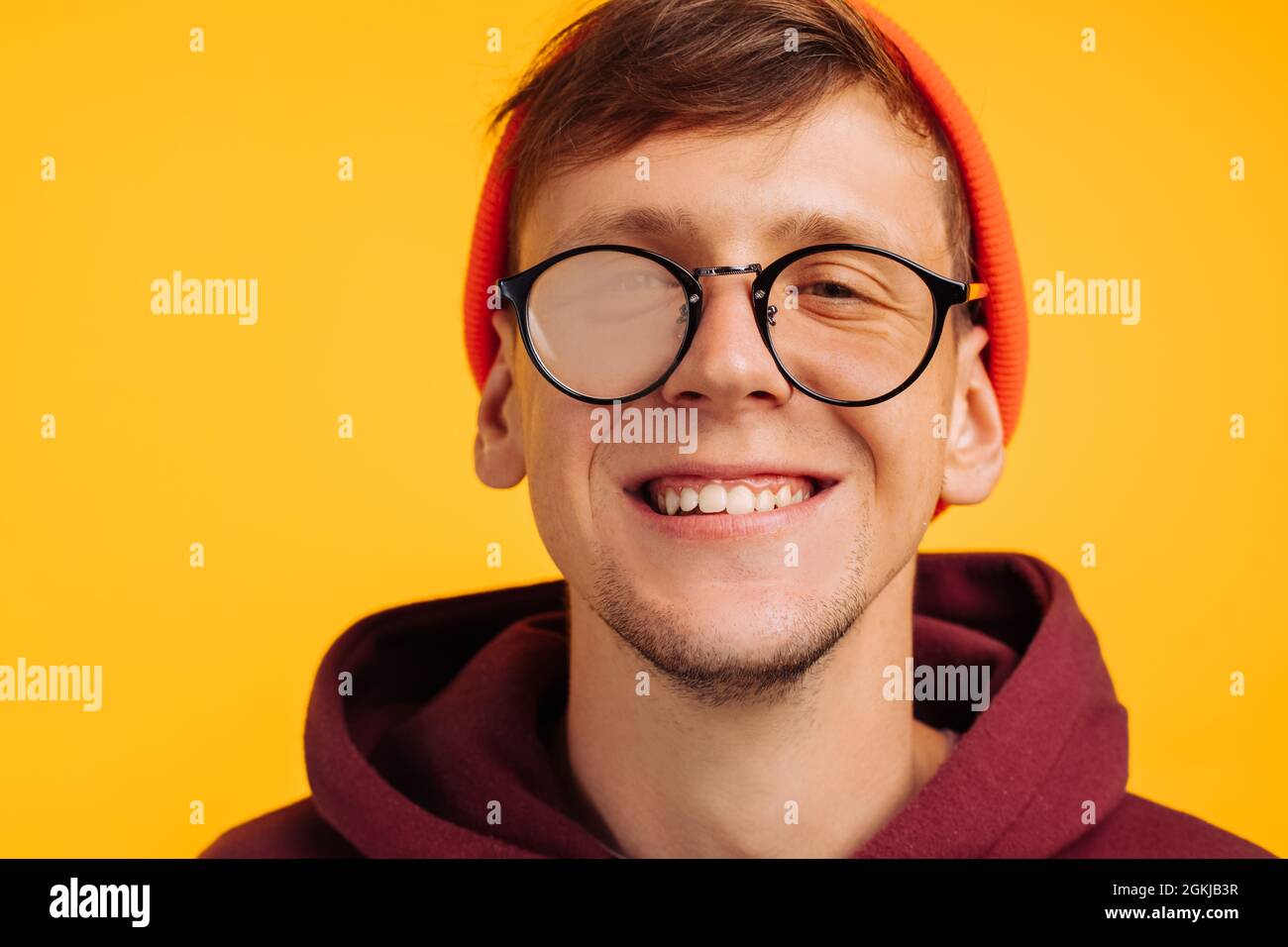 man has poor eyesight, a handsome guy in an orange hat and red light ...